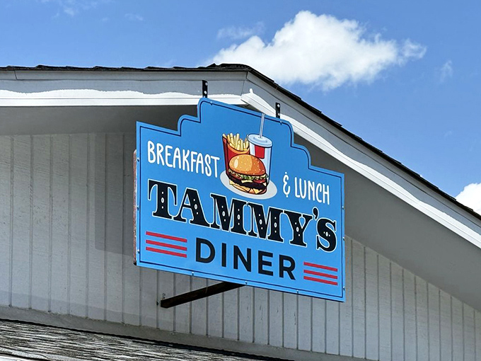 That blue sign against white clapboard&mdash;like a beacon calling to hungry travelers and locals alike. Simplicity never goes out of style.