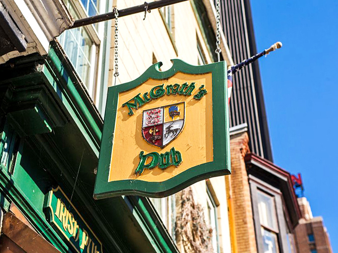 The hanging pub sign swings gently in the breeze, a medieval-style herald announcing "good food and drink lie within these walls."