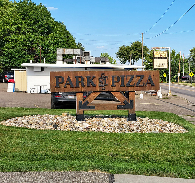 A sign that doesn't just mark a location but promises a pizza pilgrimage worth every mile of the journey.