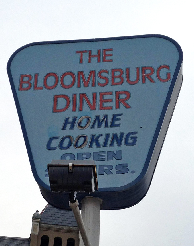 The retro sign promises "HOME COOKING" &ndash; four syllables that speak volumes about what awaits inside.