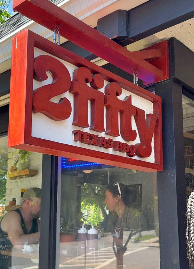 The red 2Fifty sign burns bright like a beacon for barbecue pilgrims seeking their holy grail experience.