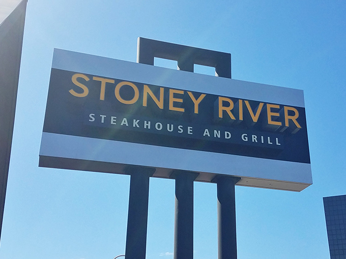 The sign stands tall against the Tennessee sky, a beacon for those seeking refuge from mediocre meals and uninspired dining experiences. 