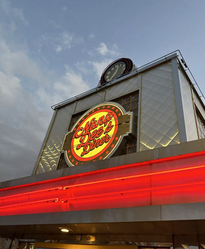 As dusk falls, Nana Dee's neon sign glows like a lighthouse guiding hungry travelers to a safe harbor of comfort food.