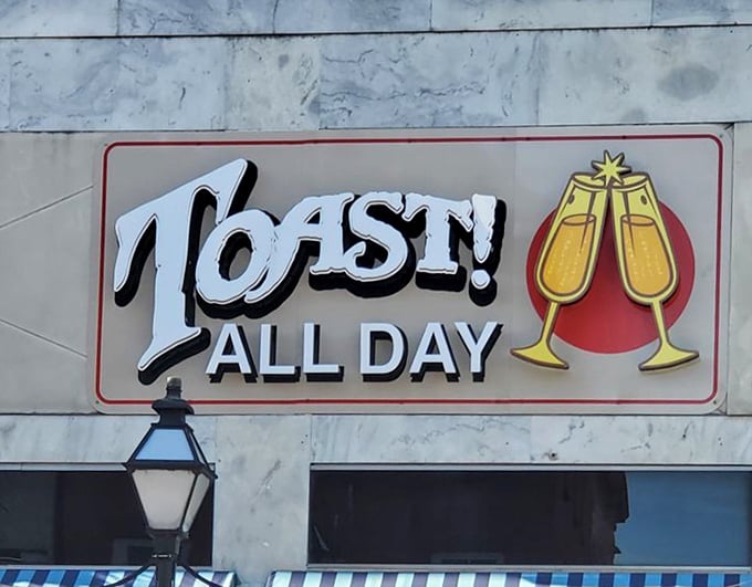 The sign says it all &ndash; a celebration in two champagne glasses, promising toasts and good times from sunrise to well past noon.