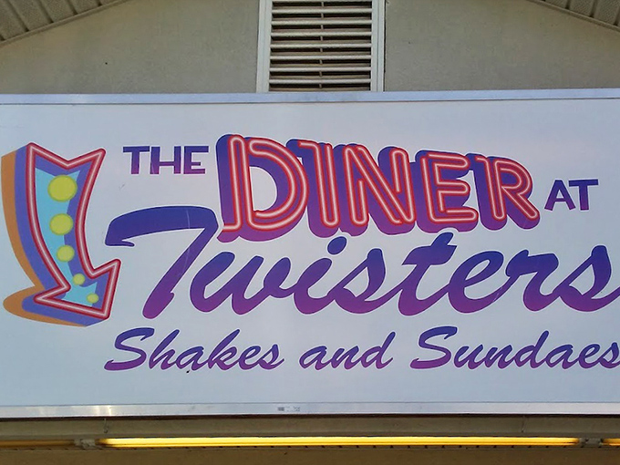The neon-bright sign promises two worlds under one roof&mdash;diner classics and frozen delights. It's not just a logo; it's a beacon of deliciousness.
