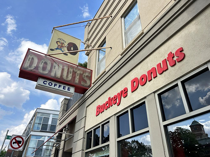 Vintage signage that speaks to the soul. This retro marquee has been guiding hungry travelers to donut salvation for generations.
