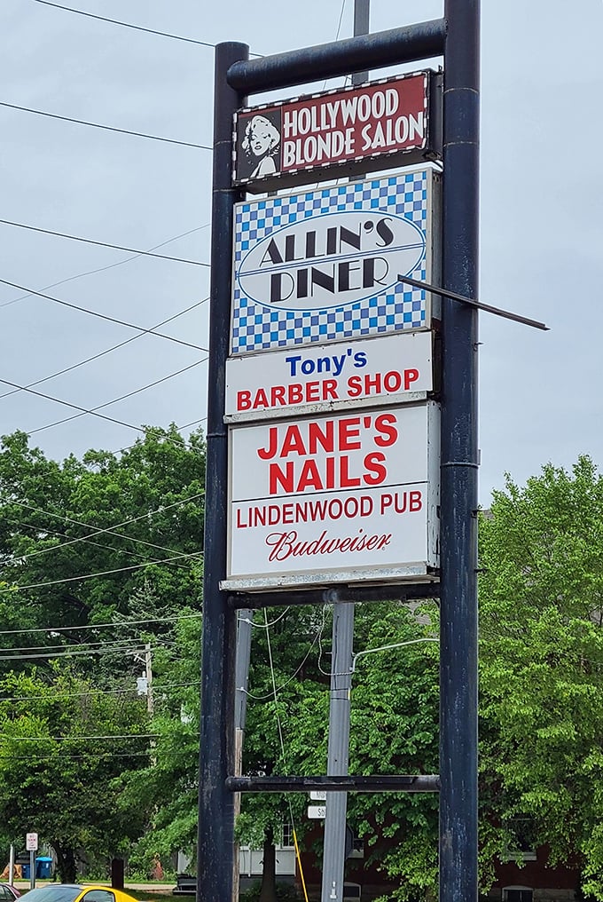 The sign stands tall among neighbors, a beacon of breakfast hope. Like the North Star, but instead of guiding sailors, it guides the hungry.