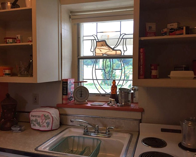 More shoe-themed stained glass, because apparently one can never have too many windows celebrating footwear.