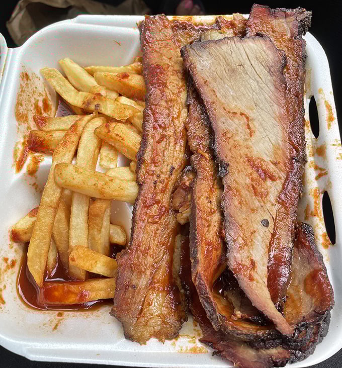 Two slices of white bread standing by, ready for their noble purpose: sopping up every last drop of that magnificent sauce.