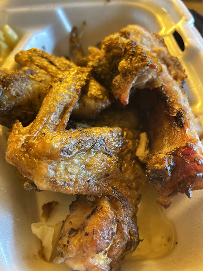 Wings with a golden-brown exterior that crackles with flavor, proving that simple food done right is the ultimate luxury.