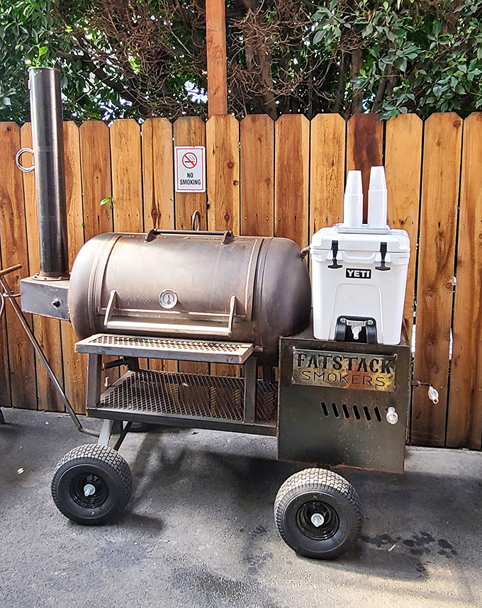 The mighty smoker works its magic around the clock, creating aromatic clouds of pure happiness.