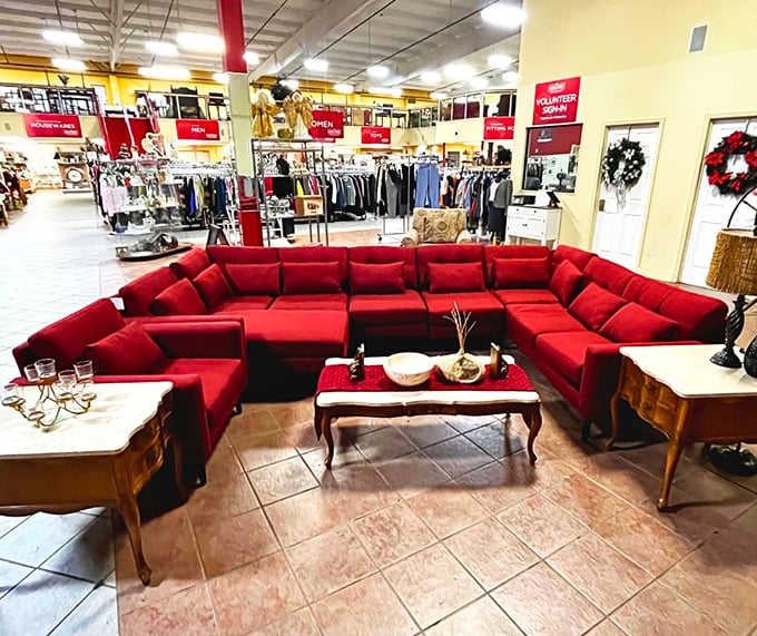 This massive red sectional isn't just a couch—it's an entire lifestyle choice that says "come over, bring friends, stay comfortable."