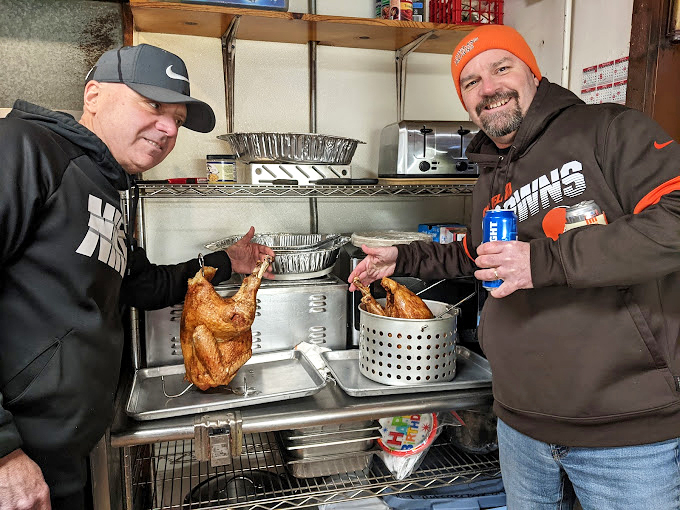 Behind every great fried turkey is a team that knows their craft. Browns gear optional, enthusiasm required.
