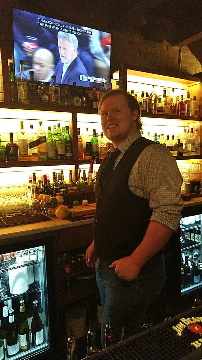 A friendly face behind the bar &ndash; where cocktail expertise meets genuine Pennsylvania hospitality.