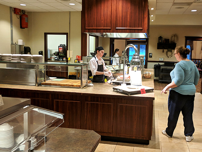 The buffet team stands ready to replenish your happiness, one perfectly prepared dish at a time.