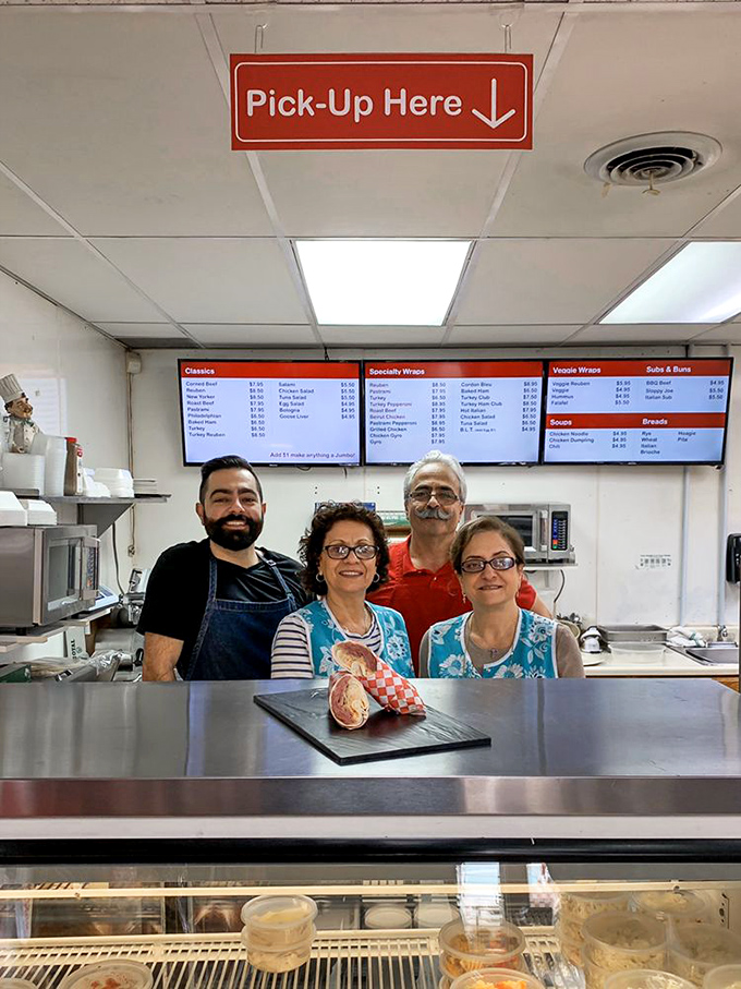The sandwich artists behind the counter, whose hands have the wisdom of thousands of perfectly constructed meals. True culinary craftspeople at work.