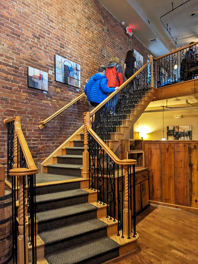 Elegant wooden stairs lead to more dining spaces, proving that good taste at Local Chop extends well beyond what's on your plate.