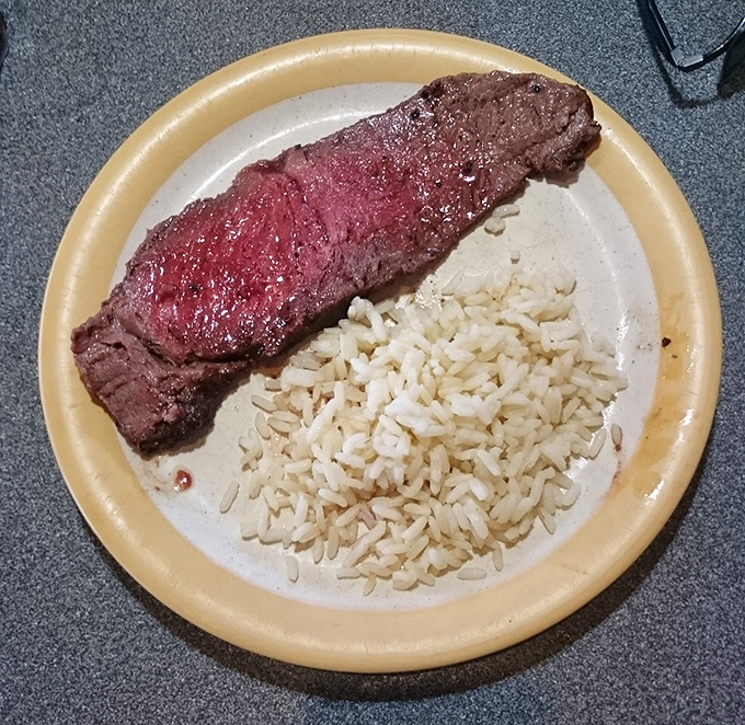 Steak cooked exactly how you like it, paired with rice that's ready to soak up every last drop of those precious meat juices.