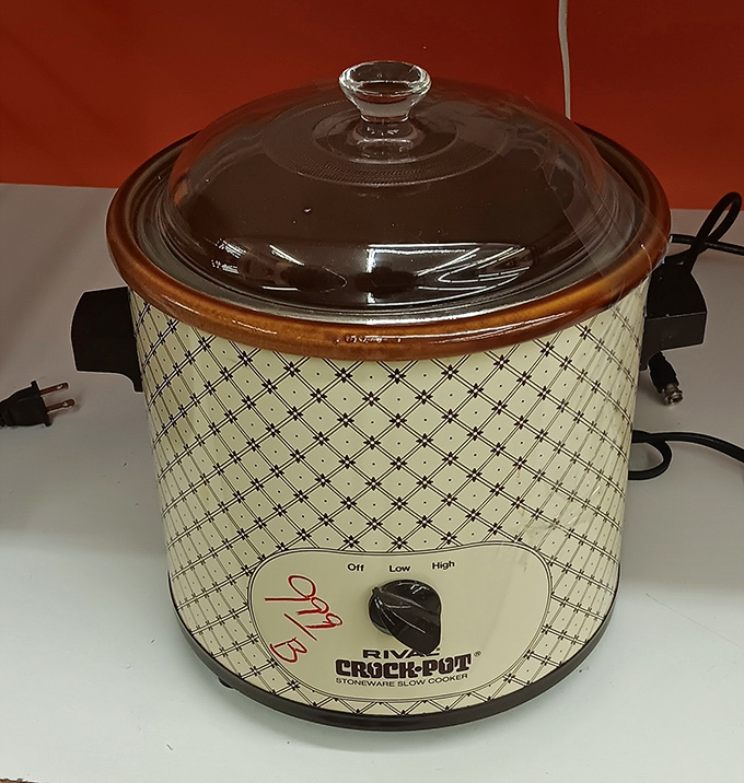 The slow cooker that time forgot! This patterned beauty probably made countless pot roasts before finding its way here, ready for a second act.