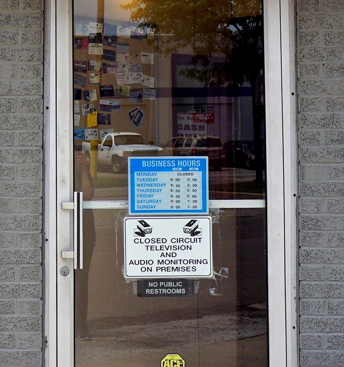 Business hours posted with no-nonsense clarity. The "Closed Monday" gives the staff a well-deserved break after feeding weekend warriors.