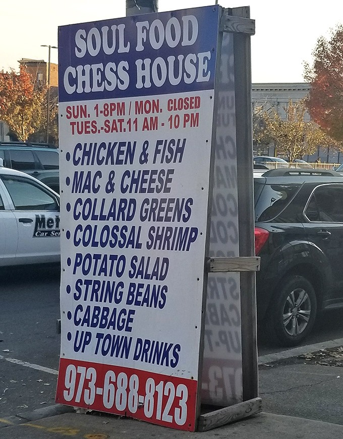 The sidewalk sign lays out the game plan: chicken, fish, mac and cheese, and those legendary colossal shrimp. Your move, hunger pangs.