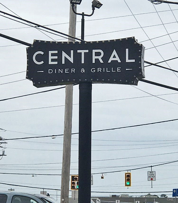 The sign stands tall against Pittsburgh's gray skies, a beacon guiding hungry travelers to comfort food salvation.