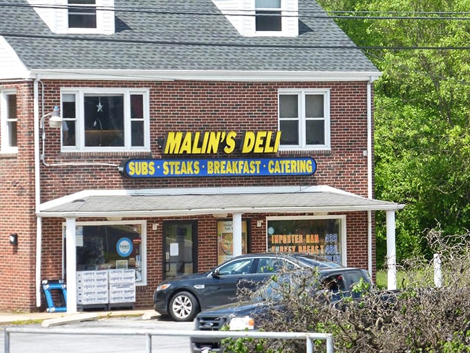 Daylight reveals the deli in all its unpretentious glory. That brick facade has witnessed countless hungry pilgrims seeking sandwich salvation.