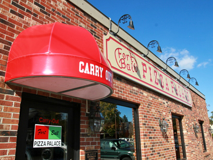 The brick exterior stands as a testament to permanence in a world of fleeting food trends. That red awning has welcomed generations of hungry Ohioans.