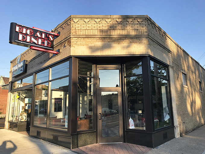 The corner storefront catches golden hour light, transforming an everyday diner into something that belongs on a postcard from breakfast paradise.