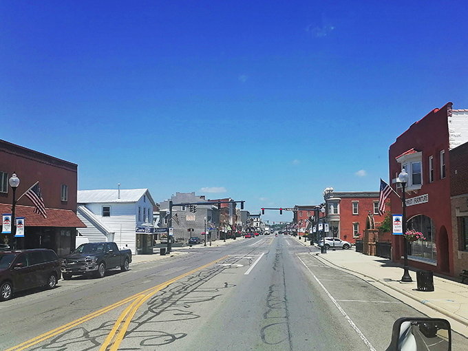 Sunlight bathes the quiet streets of downtown, where traffic lights are suggestions rather than necessities in this unhurried corner of Ohio.