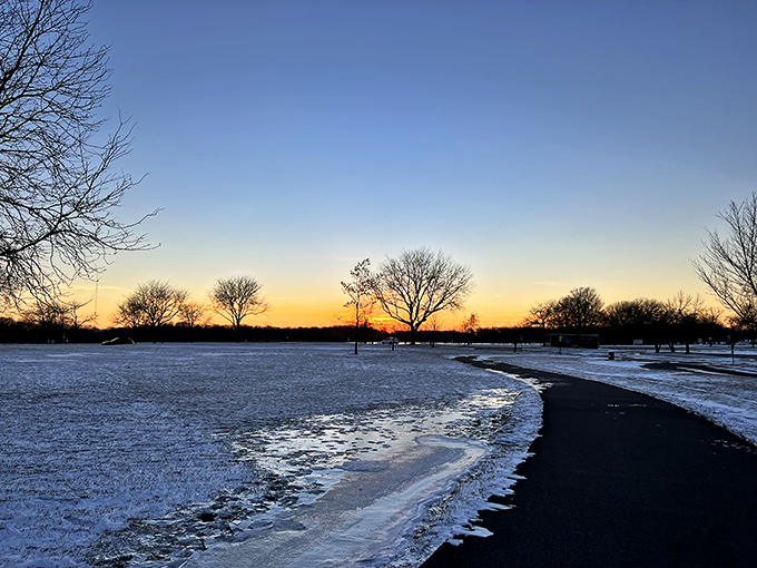 Winter sunset magic hour&mdash;when the day's last light turns even a snow-covered path into something worthy of framing above your fireplace.
