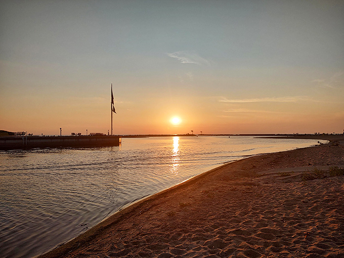Mother Nature's nightly light show turns New Buffalo's horizon into a canvas of liquid gold, making even non-morning people consider tomorrow's sunrise.