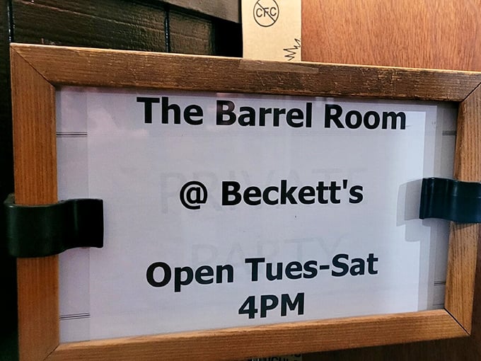 The Barrel Room's hours posted like an invitation to happiness. Tuesday through Saturday, 4PM&mdash;when the magic begins.