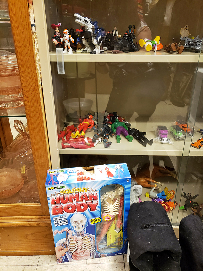 Vintage action figures and toys stand frozen in time, waiting for collectors who recognize childhood friends from Saturday mornings past.