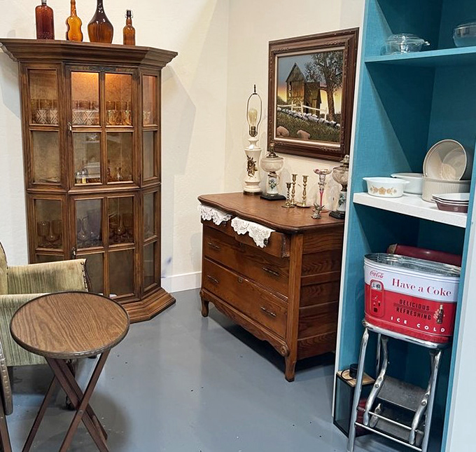 Vintage storage solutions that bring character to any room. That Coca-Cola stool is the cherry on top of this nostalgic display.