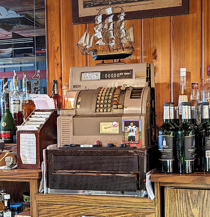 The vintage cash register isn't retro by design—it's simply never been replaced because some things just work perfectly as they are.