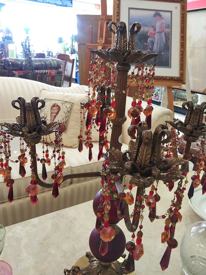 This ornate chandelier dripping with ruby-colored crystals proves that sometimes the most extraordinary finds hide in the most ordinary places.