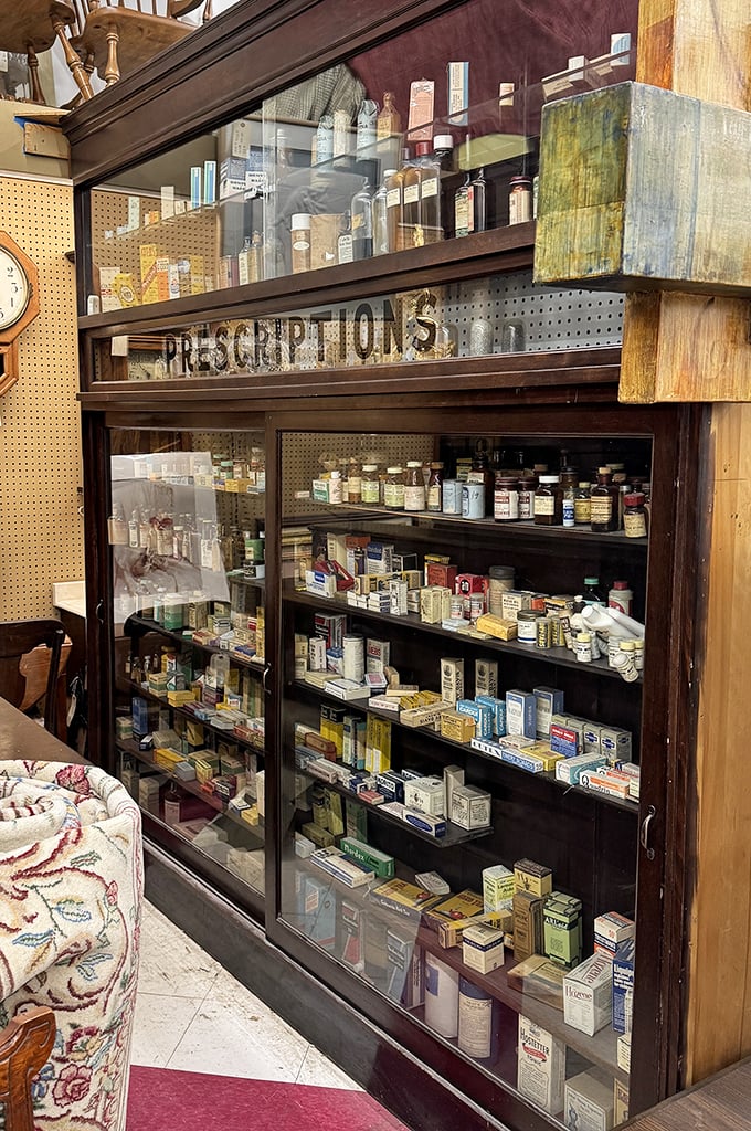 An antique pharmacy cabinet that's a medicine show of nostalgia. Those amber bottles once held remedies for everything from headaches to "female complaints."