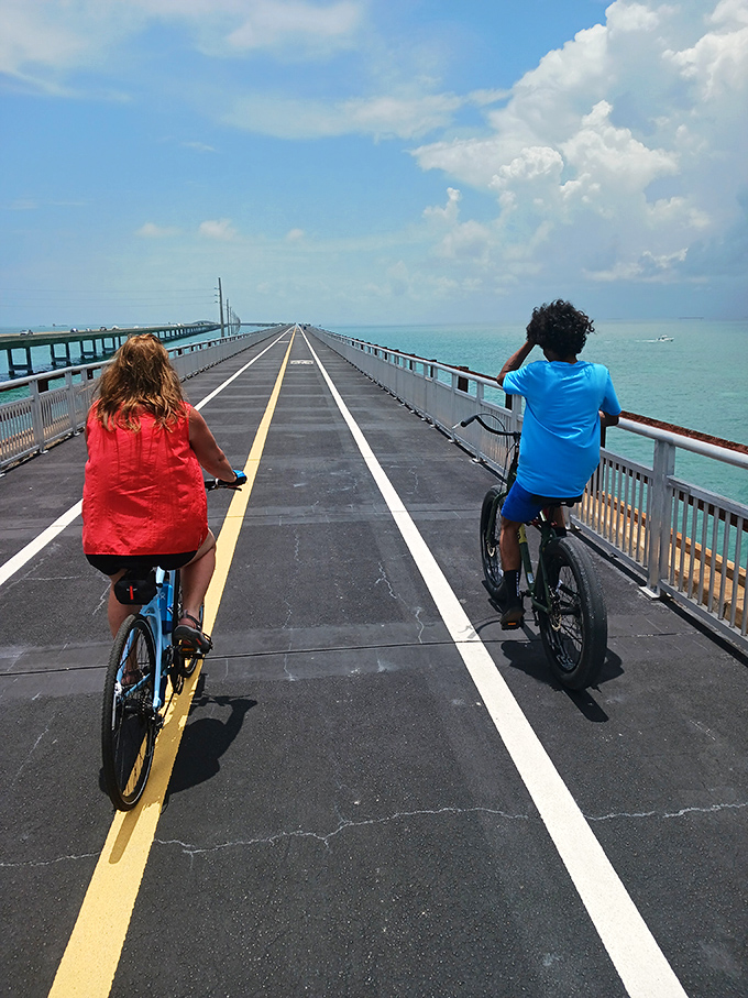 Two cyclists, one yellow line, infinite horizon&mdash;the Old Seven Mile Bridge offers the rare chance to pedal suspended between sky and sea.