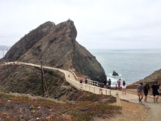 Brave souls crossing the bridge, proving that Instagram shots are worth a little vertigo.