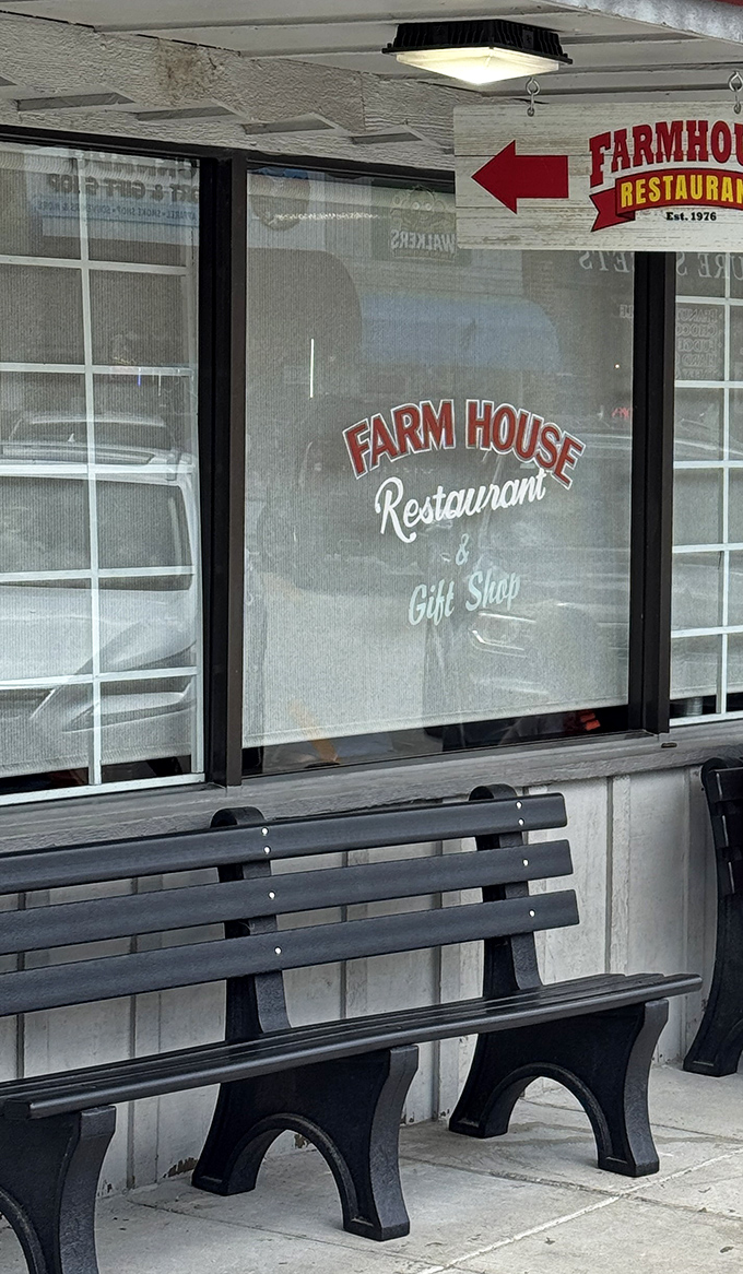 A window sign and welcoming bench invite you to pause before entering a world where calories don't count and comfort food reigns supreme.