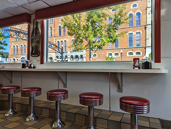 Counter seats where solo diners become temporary neighbors, sharing nothing but appreciation for good food and better coffee.