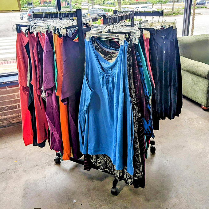 Colorful women's clothing arranged by hue creates an organized shopping experience that big-box retailers would envy.