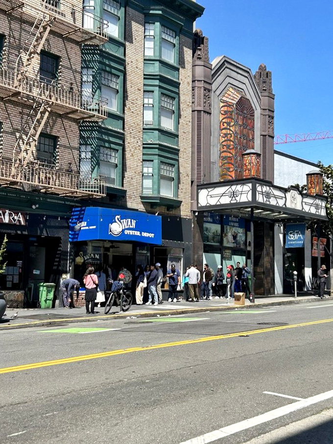 A steady line of seafood lovers waits outside this legendary San Francisco oyster spot, a tradition for over a century.