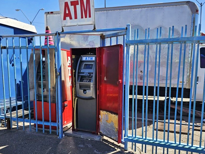 The market's ATM—where cash becomes king. In this haggler's paradise, having currency on hand is your ticket to negotiation success.