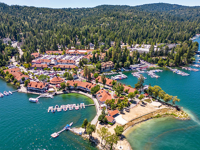 An aerial view reveals Lake Arrowhead's perfect horseshoe cove embraced by dense forest. No wonder Hollywood has used this backdrop for decades.