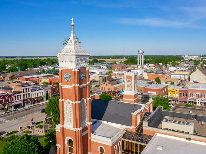 From above, Greensburg reveals its perfect town square symmetry, with that famous courthouse tower standing like a botanical exclamation point.