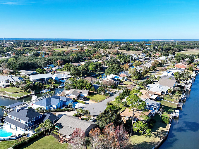 An aerial view that explains everything&mdash;water on all sides, boats in backyards, and sunshine everywhere. This isn't just a location; it's a lifestyle.