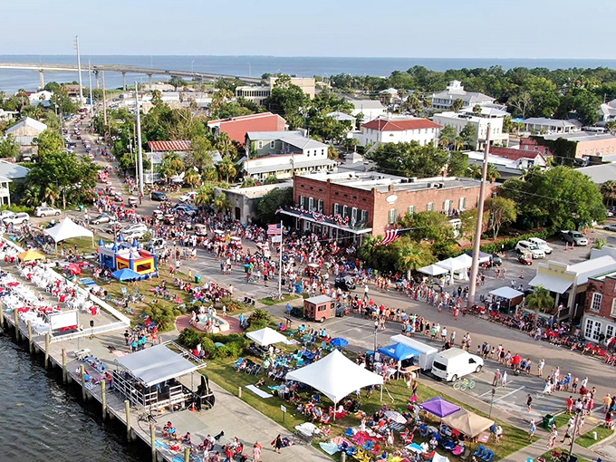 From above, Apalachicola reveals its perfect proportions&mdash;a waterfront town where historic architecture meets natural beauty in harmonious balance.