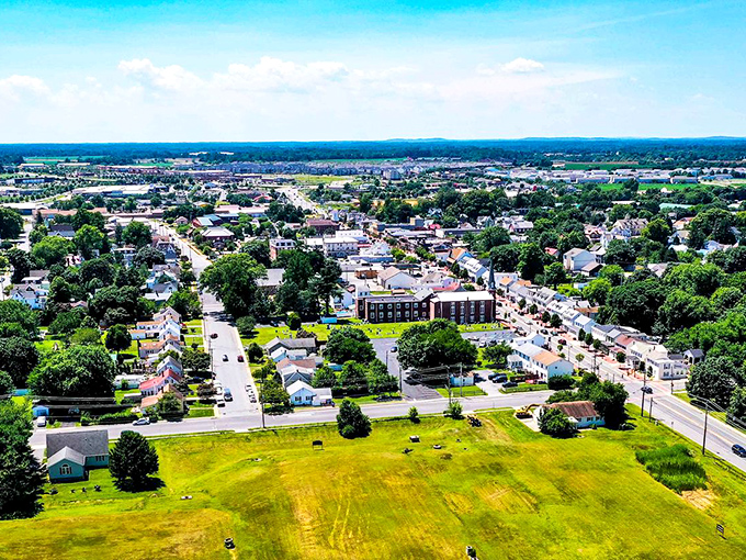 Bird's eye perfection! Middletown spreads out like a patchwork quilt of neighborhoods, green spaces, and community gathering spots under Delaware's big blue sky.